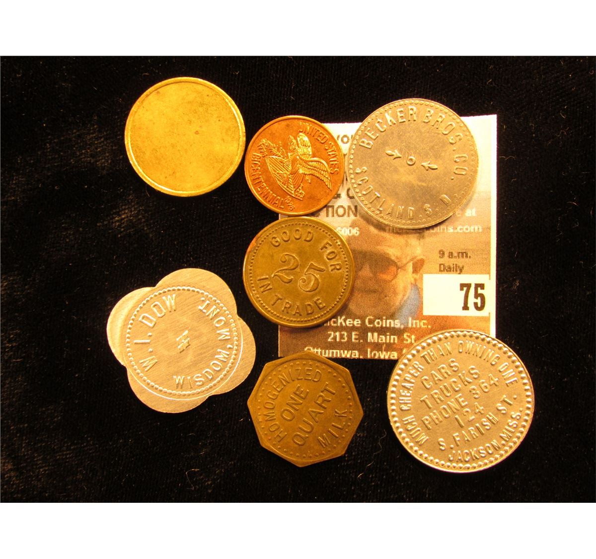 Plastic case with (7) various tokens including a Creamery Token.
