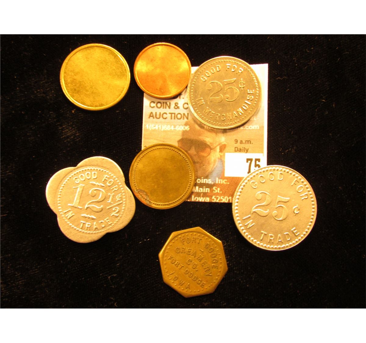 Plastic case with (7) various tokens including a Creamery Token.