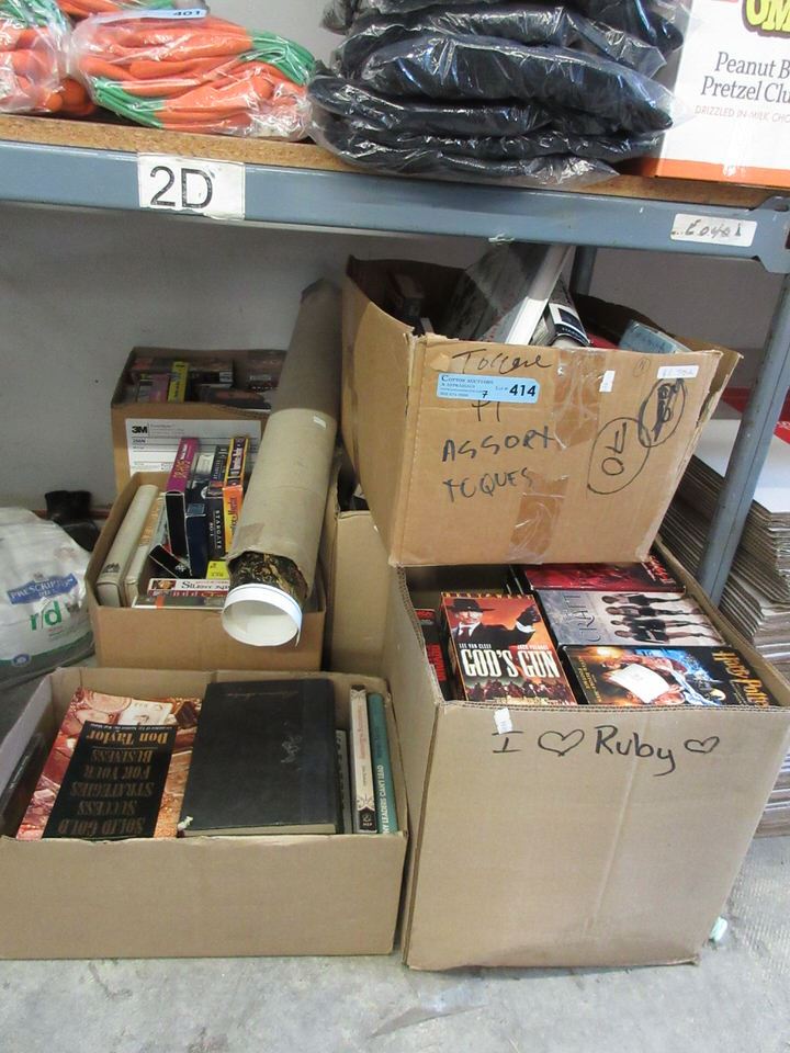 7 Boxes of books & VHS tapes