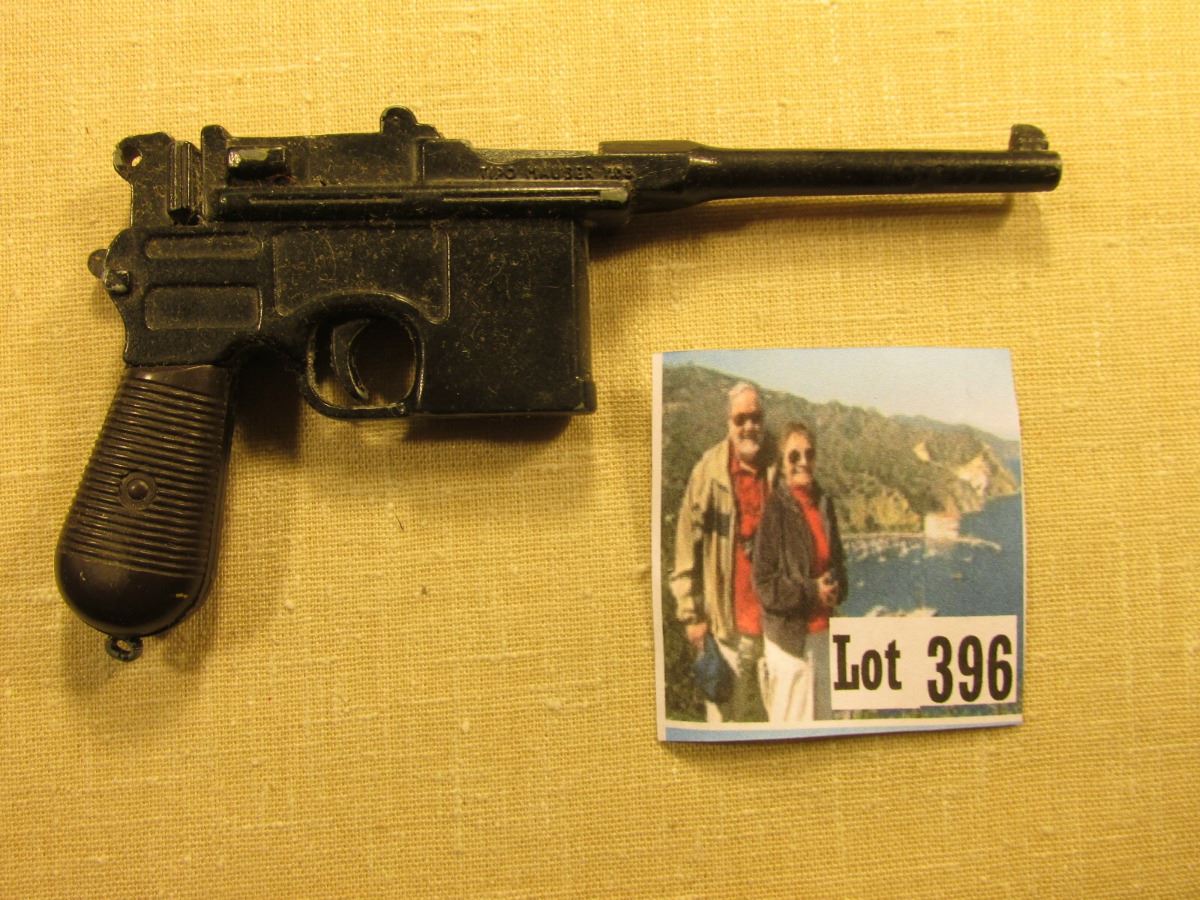 "Uniwerk Italy" miniature Broom handle Mauser Pistol.