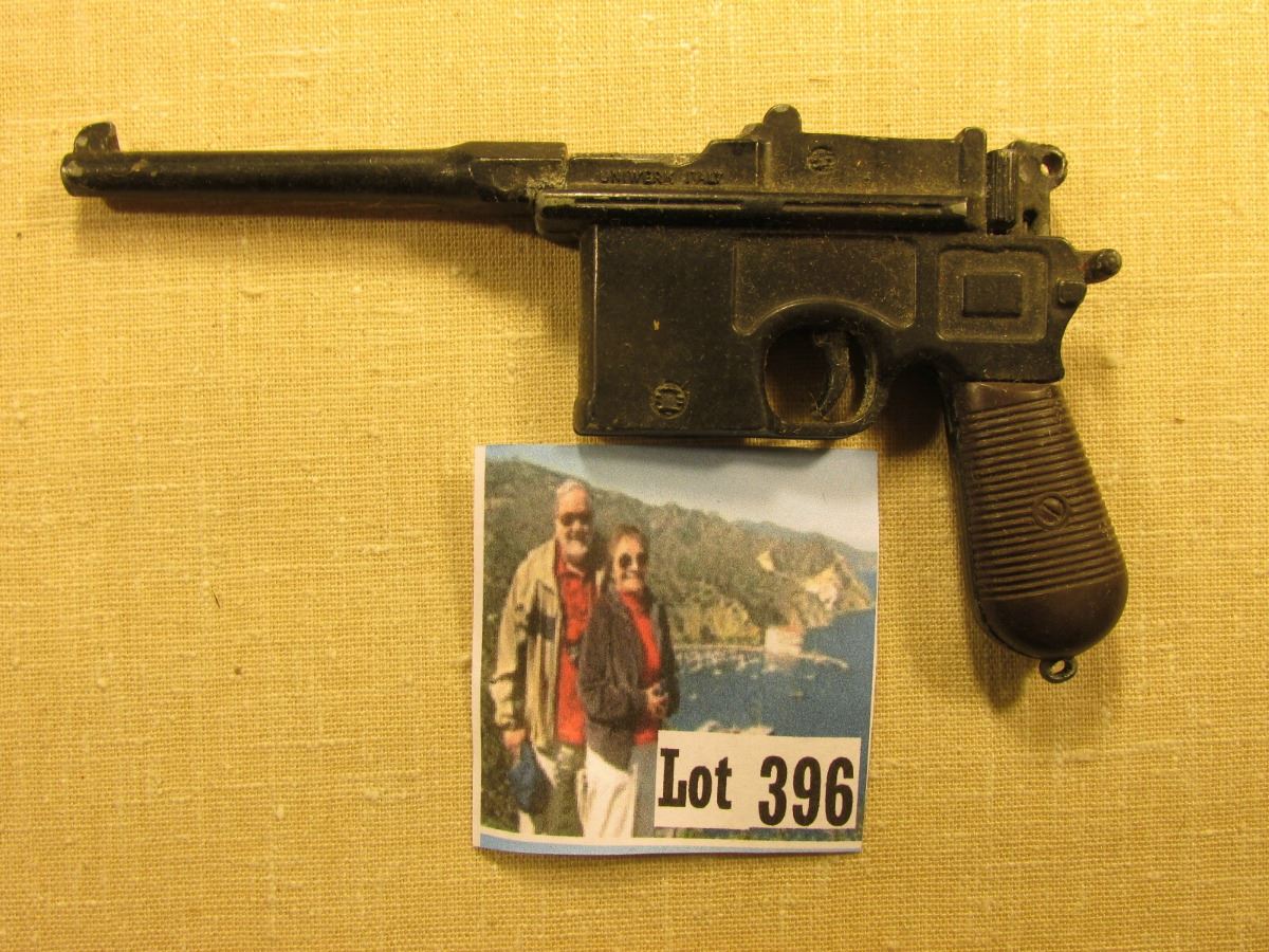 "Uniwerk Italy" miniature Broom handle Mauser Pistol.