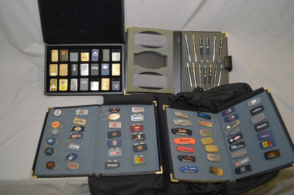 Selection of Zippo cased salesman samples including lighters, pens, key ...