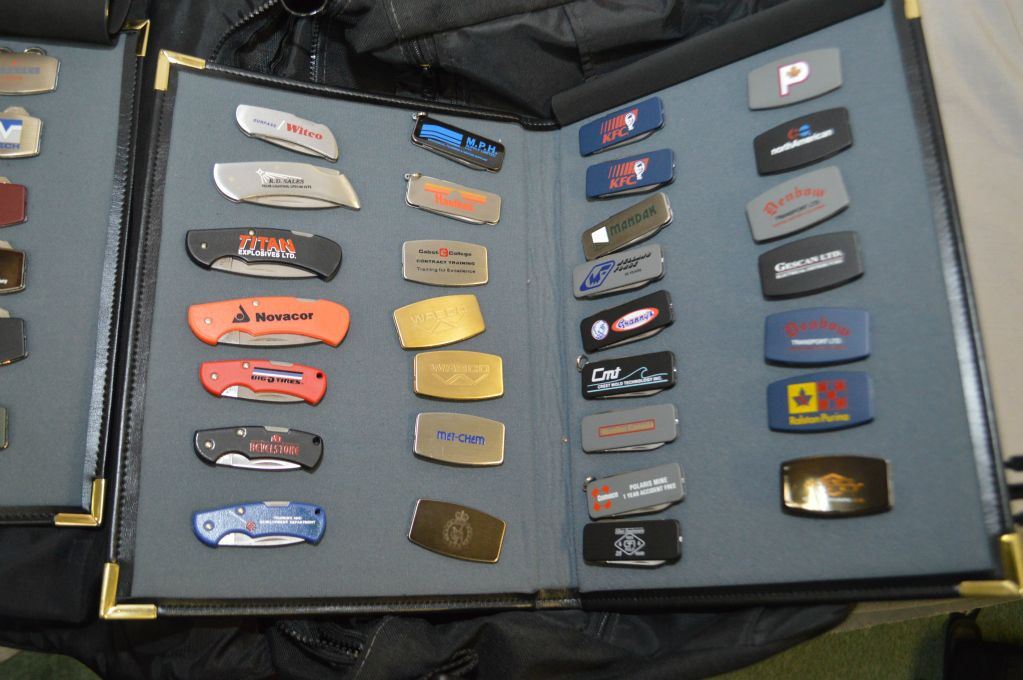 Selection of Zippo cased salesman samples including lighters, pens, key ...