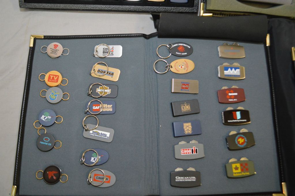 Selection of Zippo cased salesman samples including lighters, pens, key ...