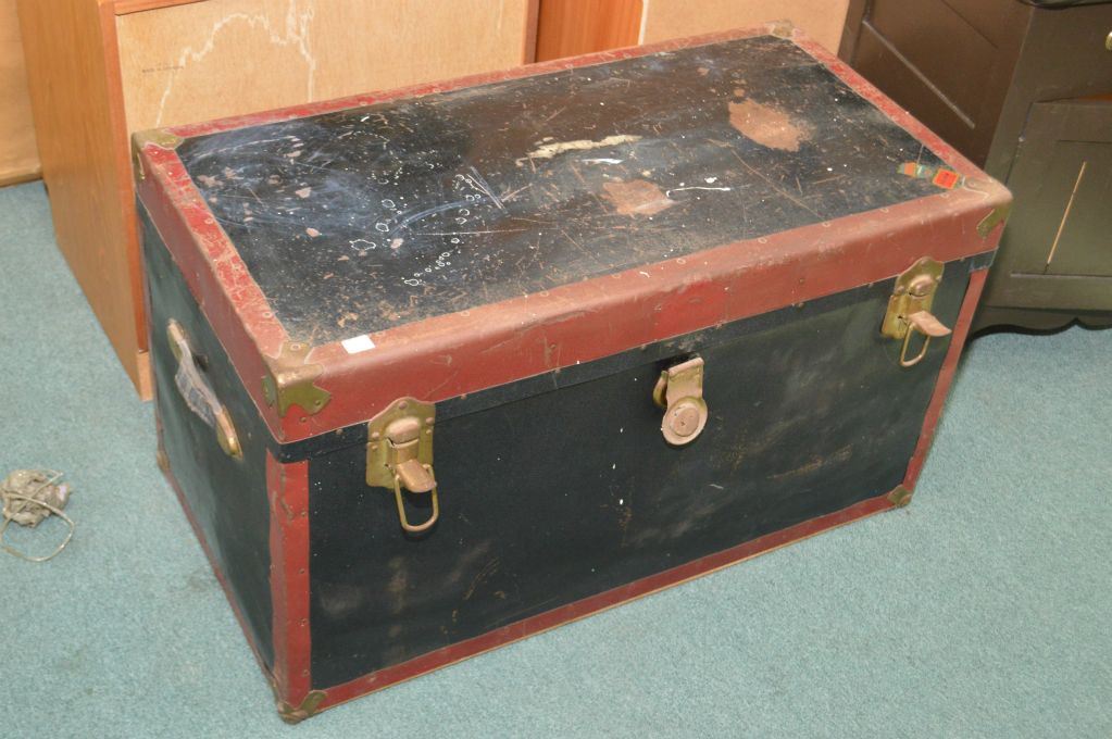 Vintage metal steamer trunk with tray