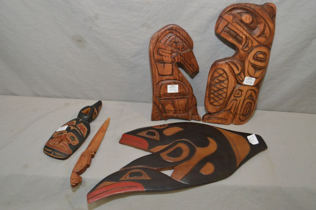 Selection of original Haida art including carved raven wall plaque ...