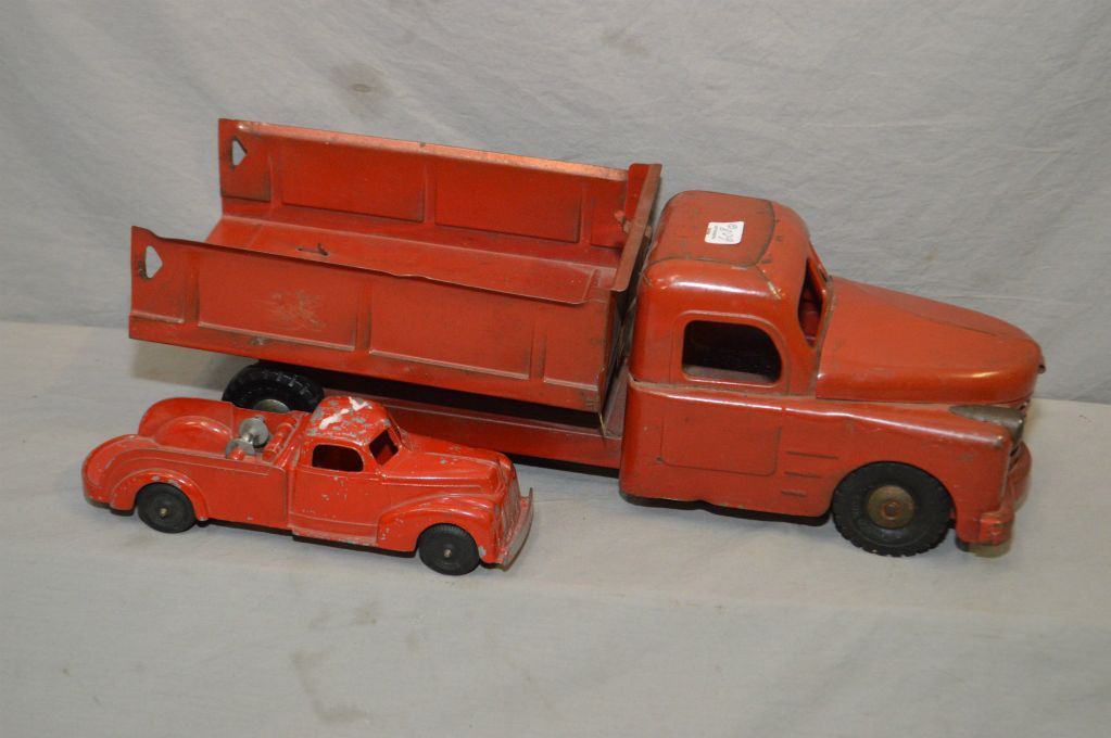 Two vintage tin plate trucks including a Structo dump truck and a ...