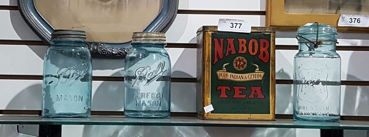 THREE ANTIQUE BLUE SEALER JARS & NABOB TEA TIN