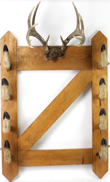 Vintage deer hoof gun rack, mounted antler holding 4 individual guns ...