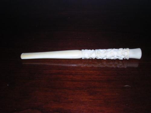 Ornate hand carved ivory pipe