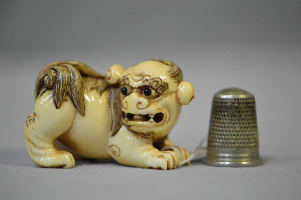 Japanese hand carved and artist signed Foo dog netsuke