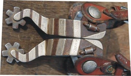 silver overlaid Texas style spurs