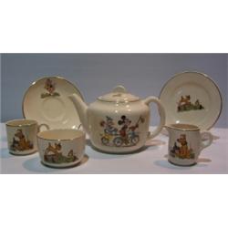 A FOURTEEN PIECE BESWICK TOY TEA SET with Disney character decoration ...