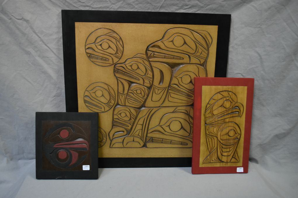 Three wooden Haida wall plaques including totem 20" X 20"