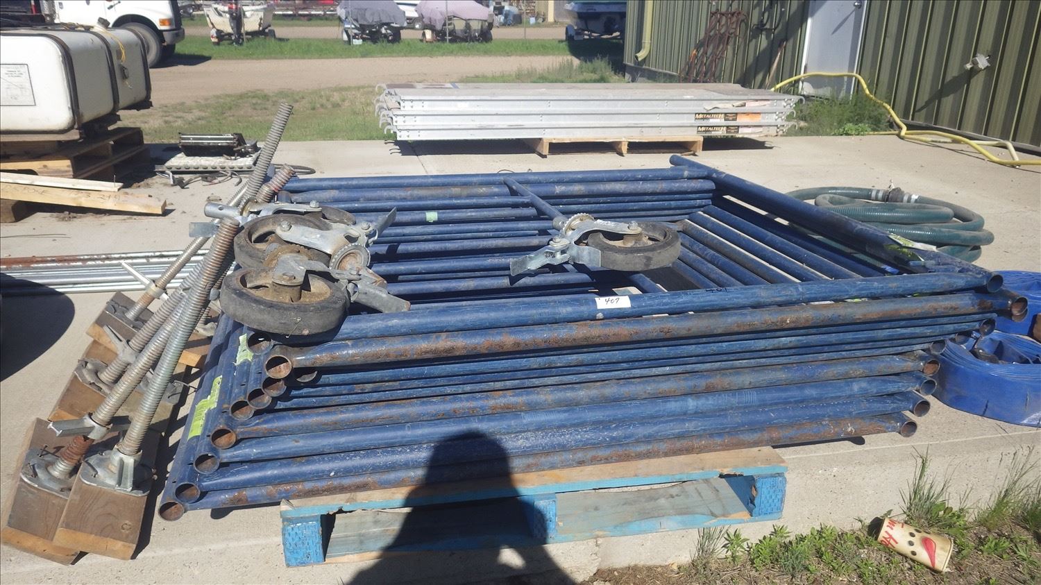 Five sections of scaffold, 10' braces, wheels, and screw braces.