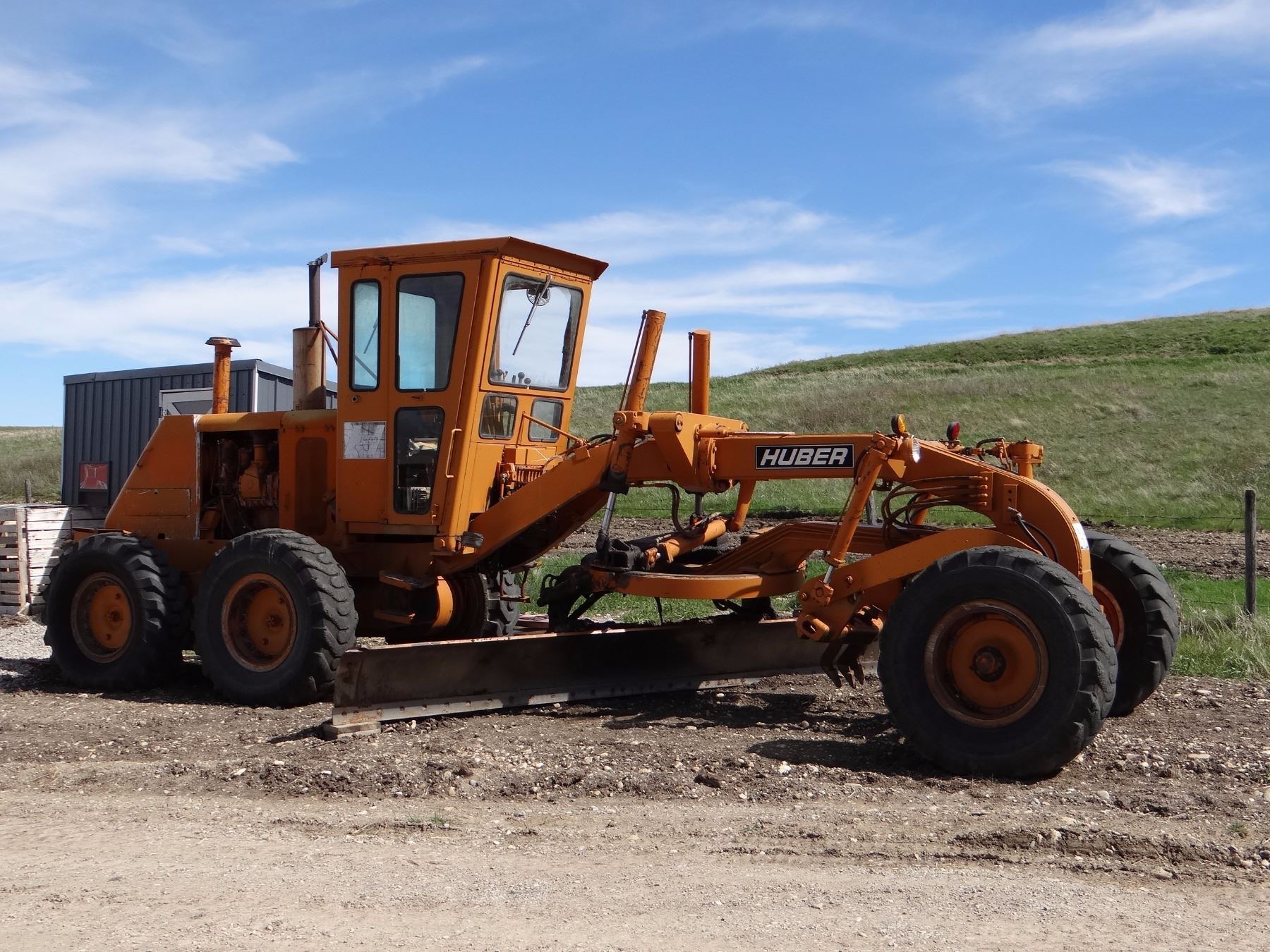Huber road grader, GMC diesel eng., 14' blade, ripper. Runs and works ...