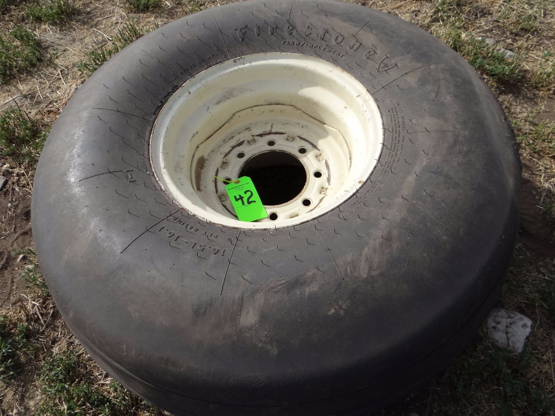 Firestone implement tire & rim, 16.5L-16.1