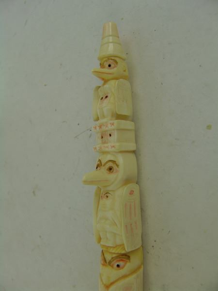 4 Miniature Totem Poles