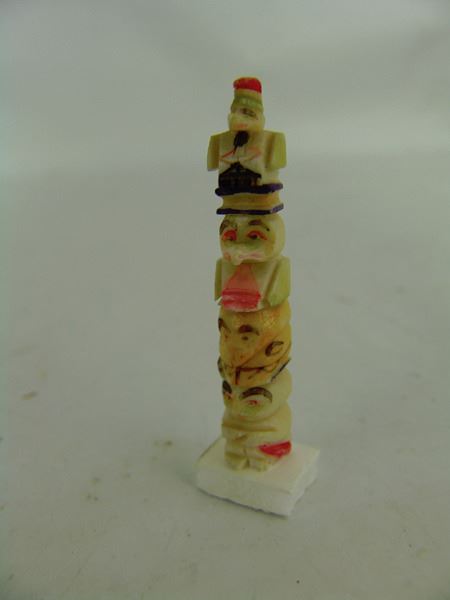4 Miniature Totem Poles