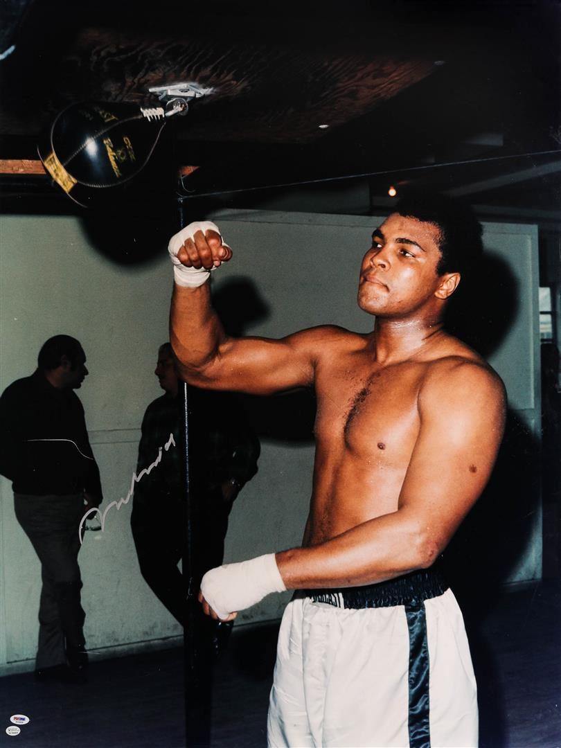 Muhammad Ali Training on Speedbag - Color Print - Come To The Auction