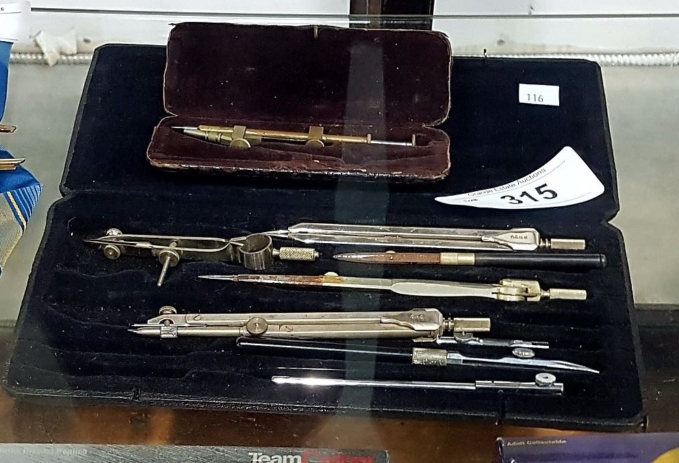 TWO SMALL DRAFTING SETS IN CASES