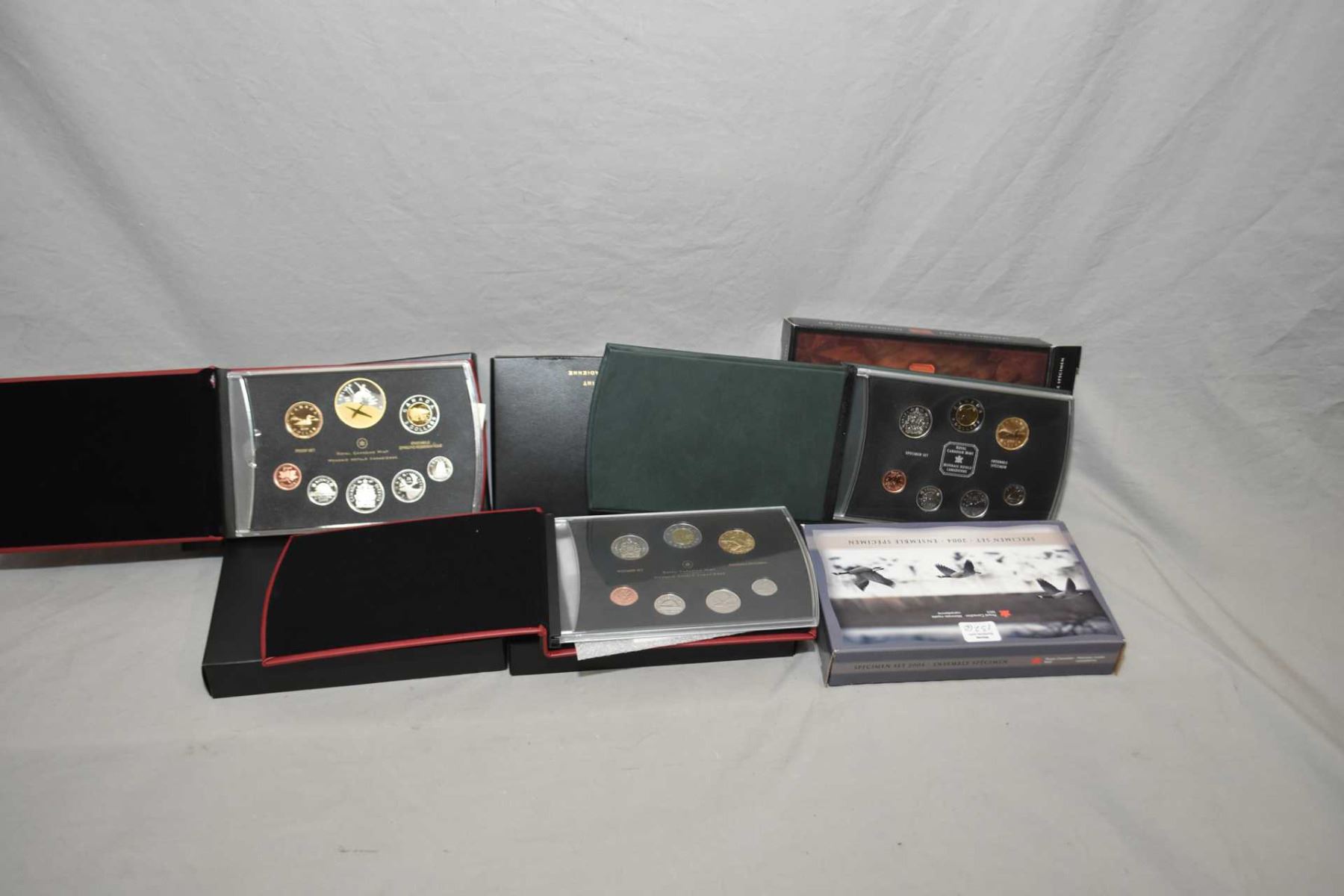 Six Royal Canadian Mint proof specimen sets including 2003, 2004, 2005 ...