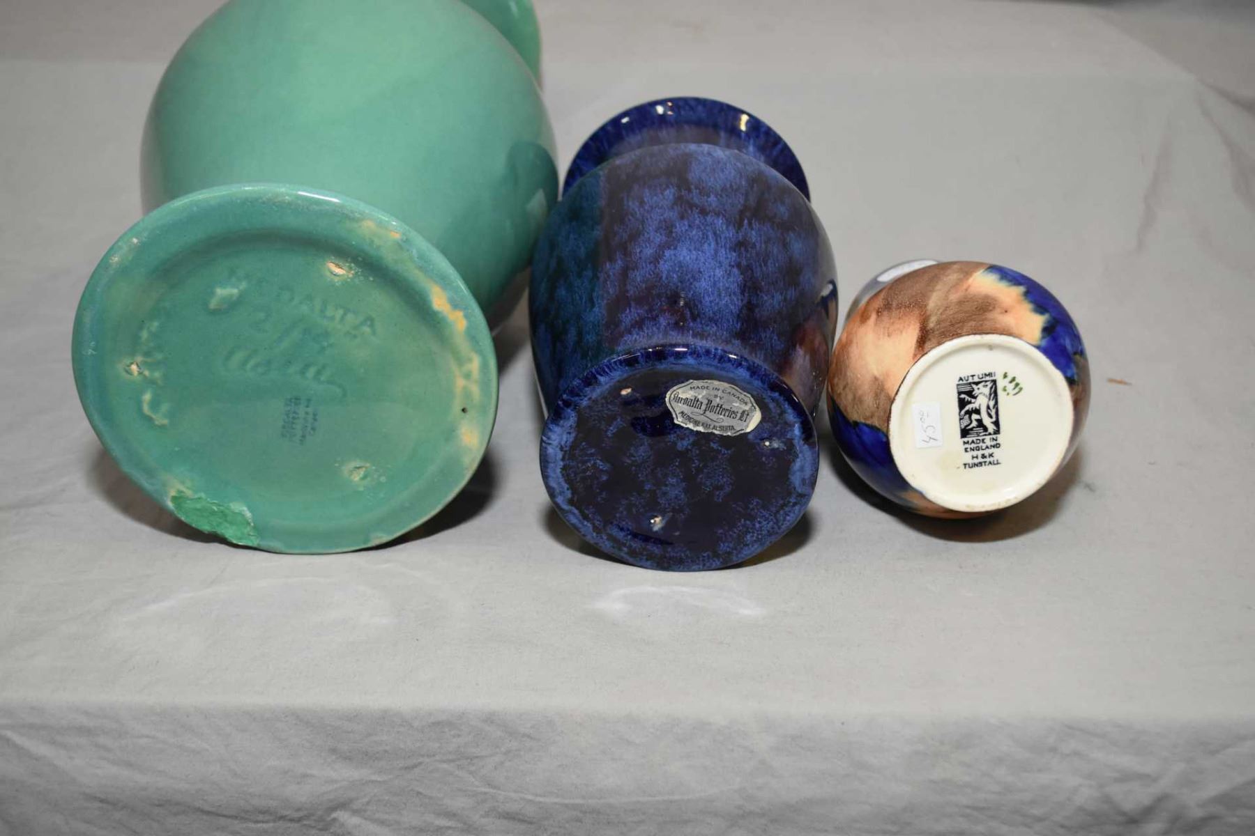 Tall green Medalta pottery "Asia" vase No. 2/14, see photo for chip in ...