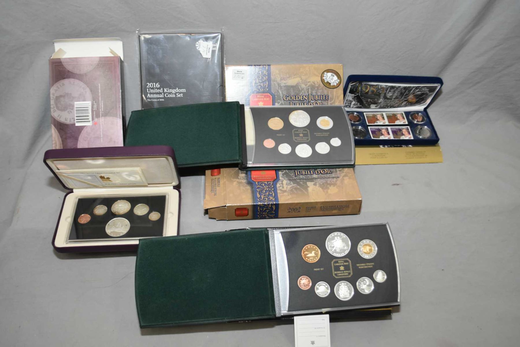 Five Royal Canadian Mint specimen sets including two 2002 Golden ...