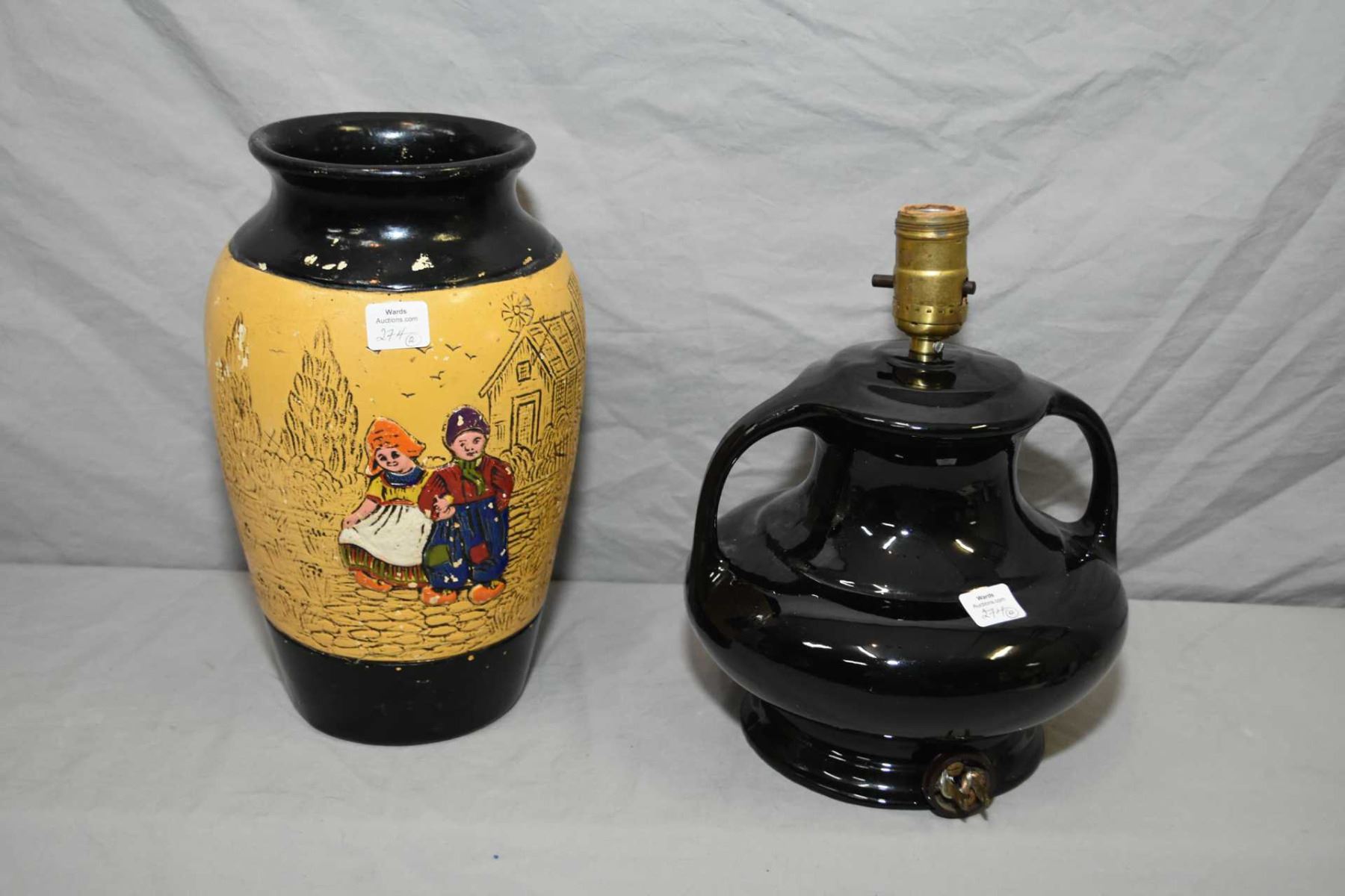Black glazed Medalta Pottery No. 16 lamp base and a No. 101 Dutch motif ...