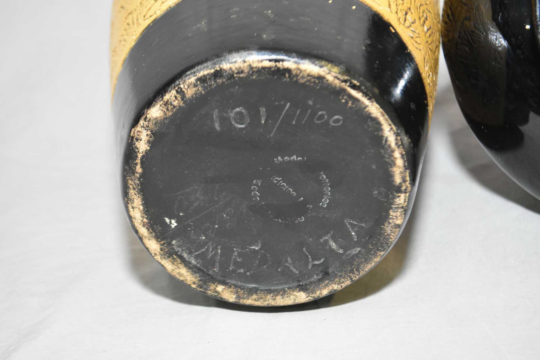 Black glazed Medalta Pottery No. 16 lamp base and a No. 101 Dutch motif ...