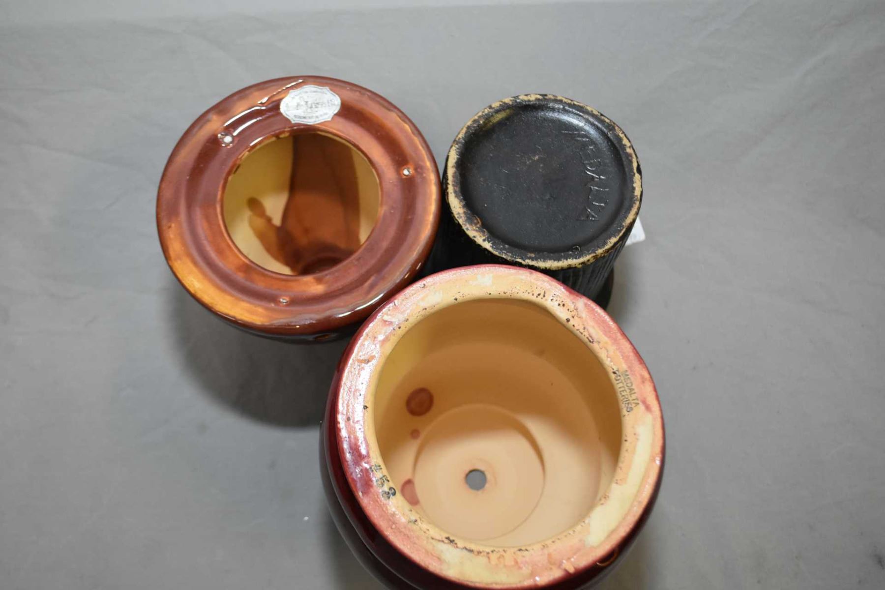 Two unusual Medalta pottery lamp vases including one beehive shaped and ...