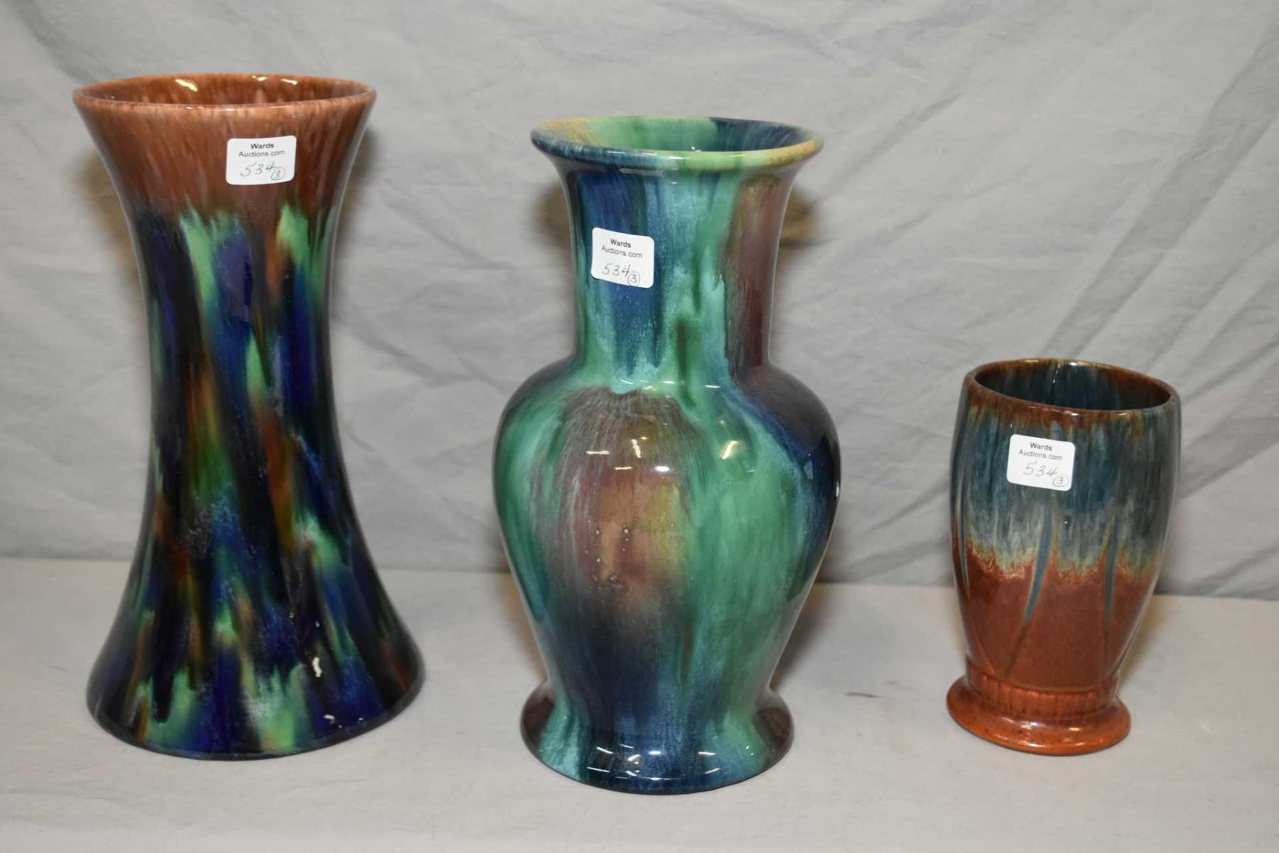 Three glazed Medalta pottery vases including a 6" vase No. 604, "Asia ...