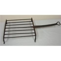 EARLY 19TH CENTURY WROUGHT IRON HANDLED TRIVET