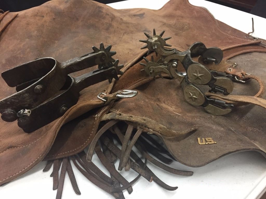 Two Pair Spurs And Leather Chaps