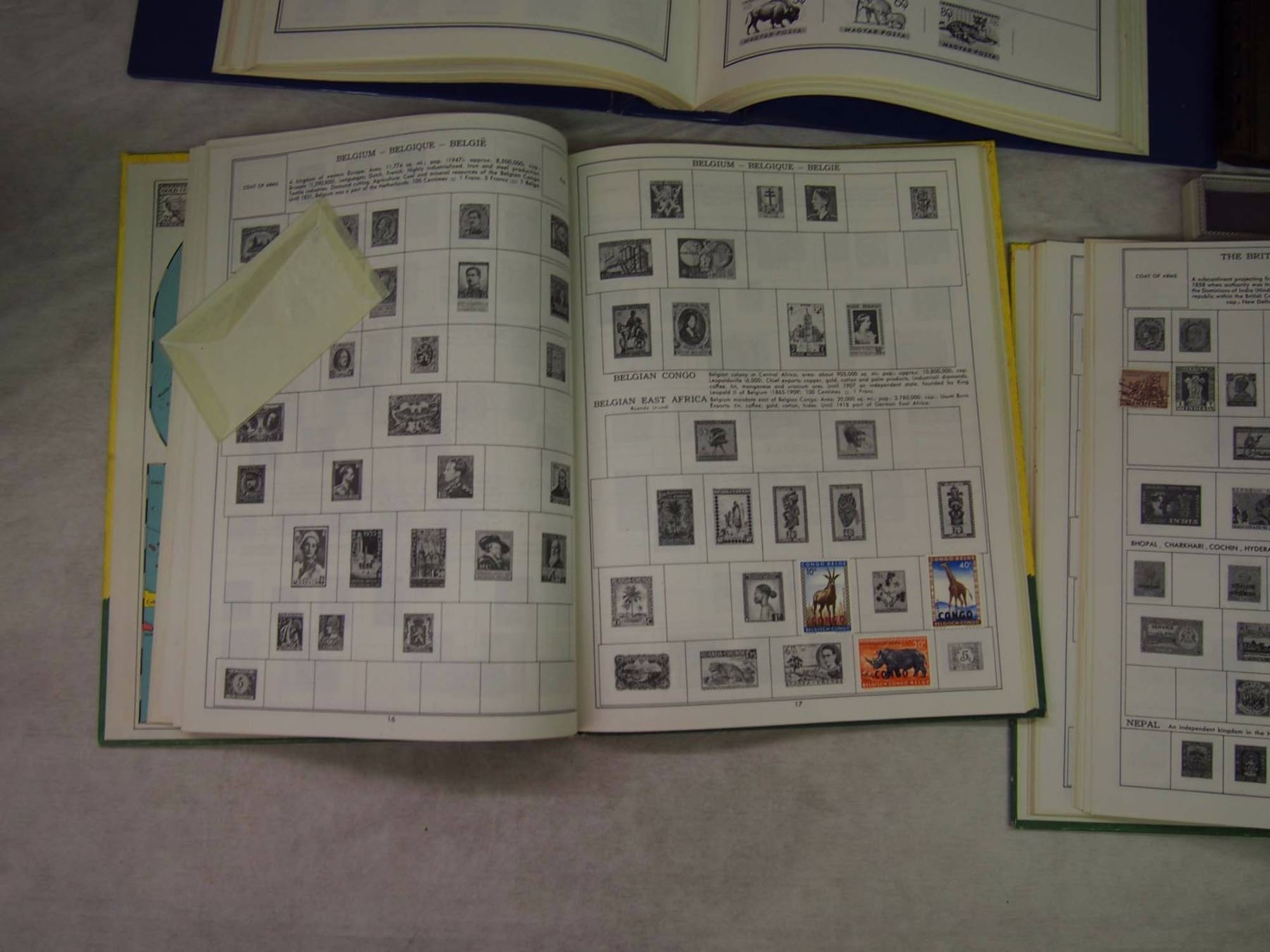 Lot Of Stamp Related (Partial Stamp Albums, Stamp Necklace, Stamp ...