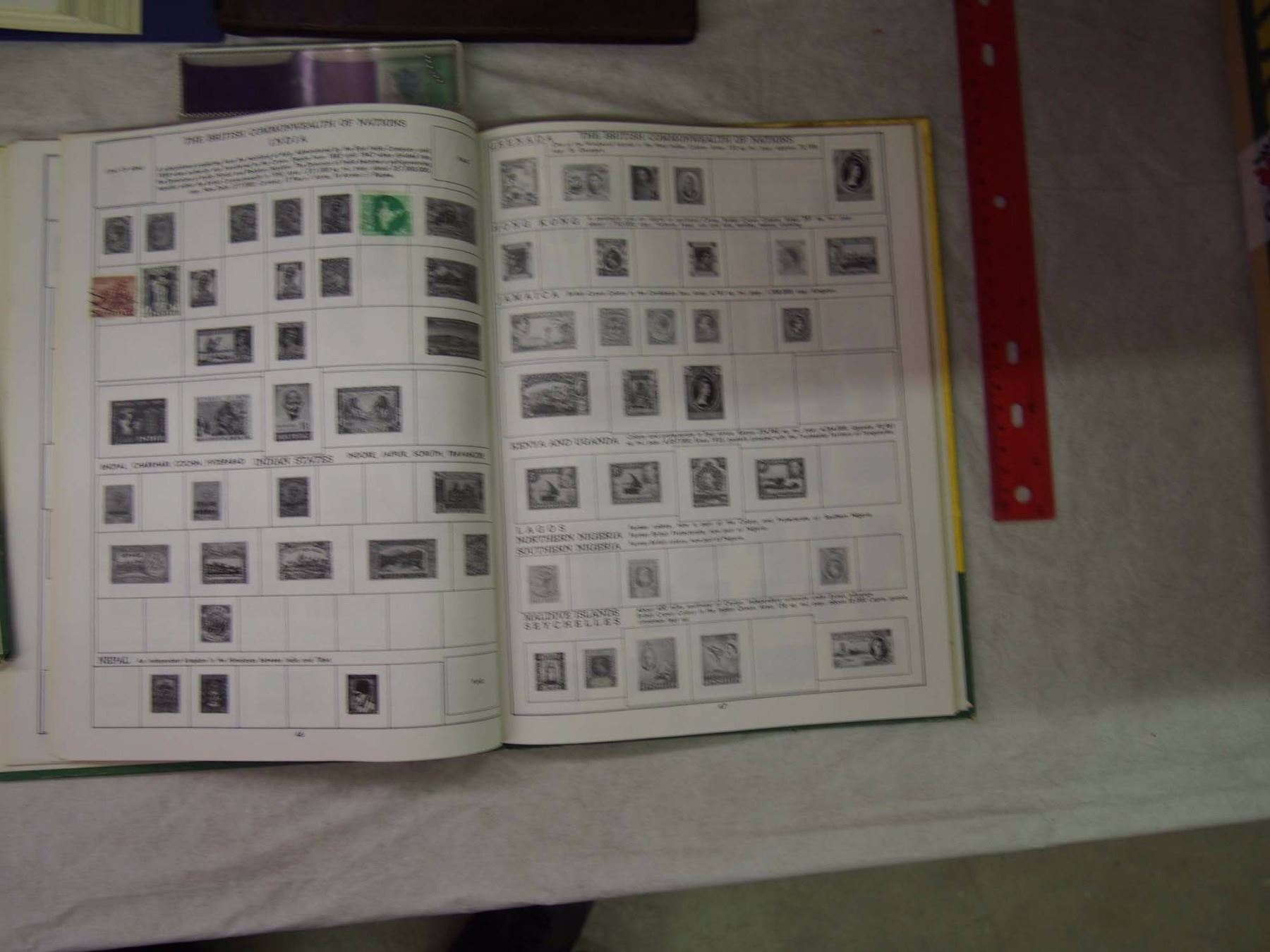 Lot Of Stamp Related (Partial Stamp Albums, Stamp Necklace, Stamp ...