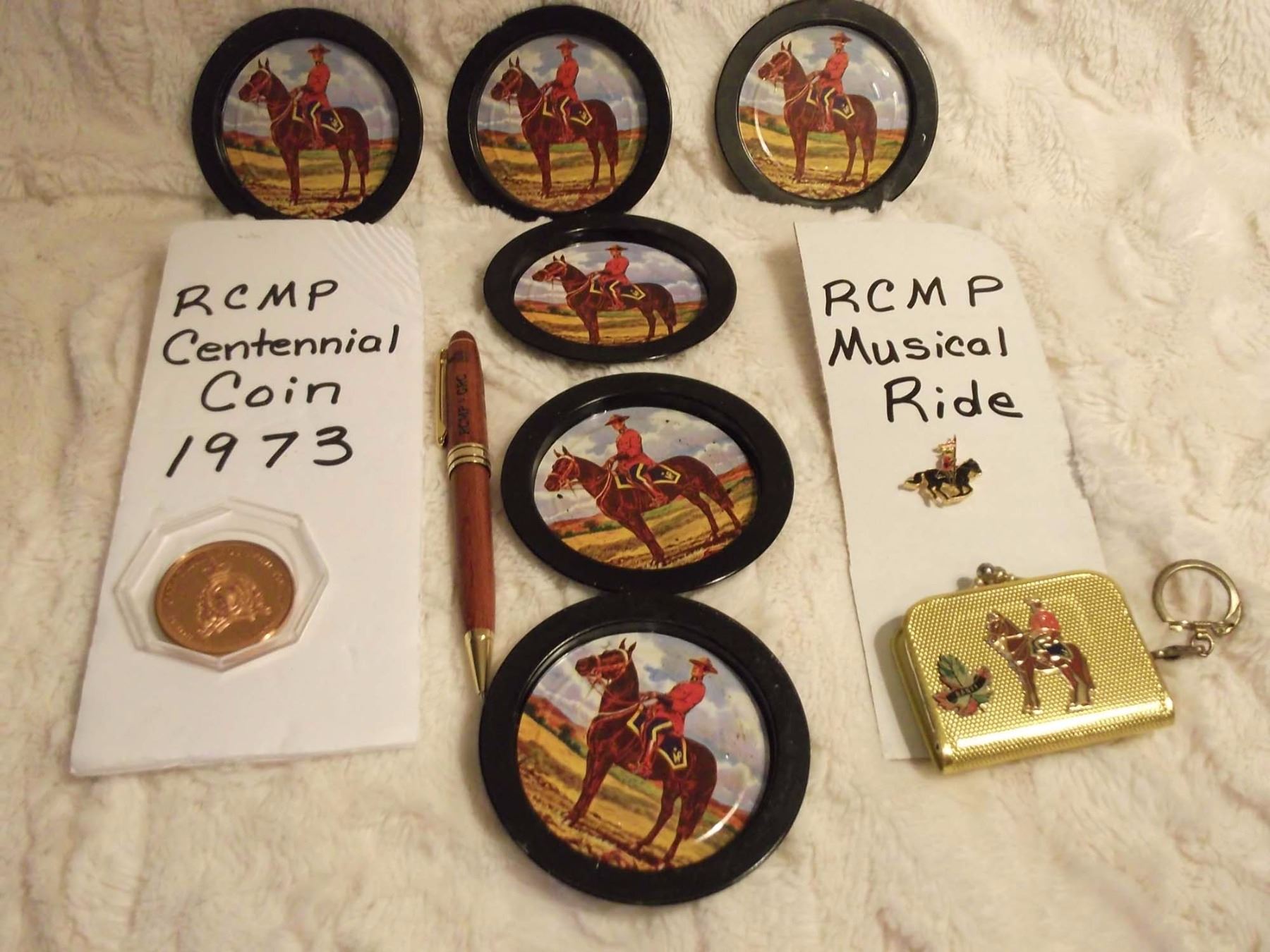 RCMP Items:1973 Centennial Coin, 6 Coasters, Pin, Pen&Change Purse