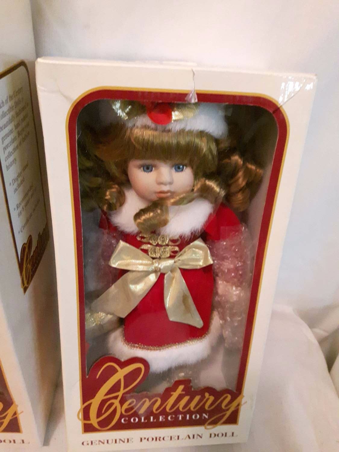 Hand Crafted Century Collection Genuine Porcelain Dolls(2)