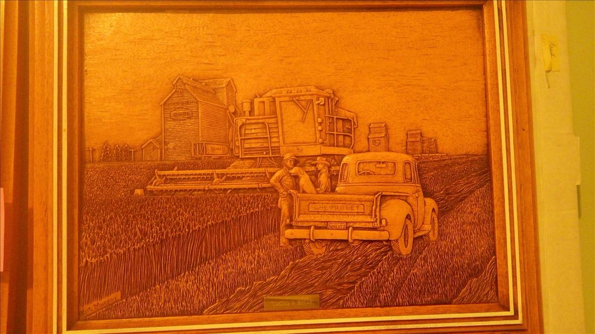 SET OF 2 "HARVEST TIME" AND "TAKING A BREAK" CARVED PICTURES BY KIM MURRAY