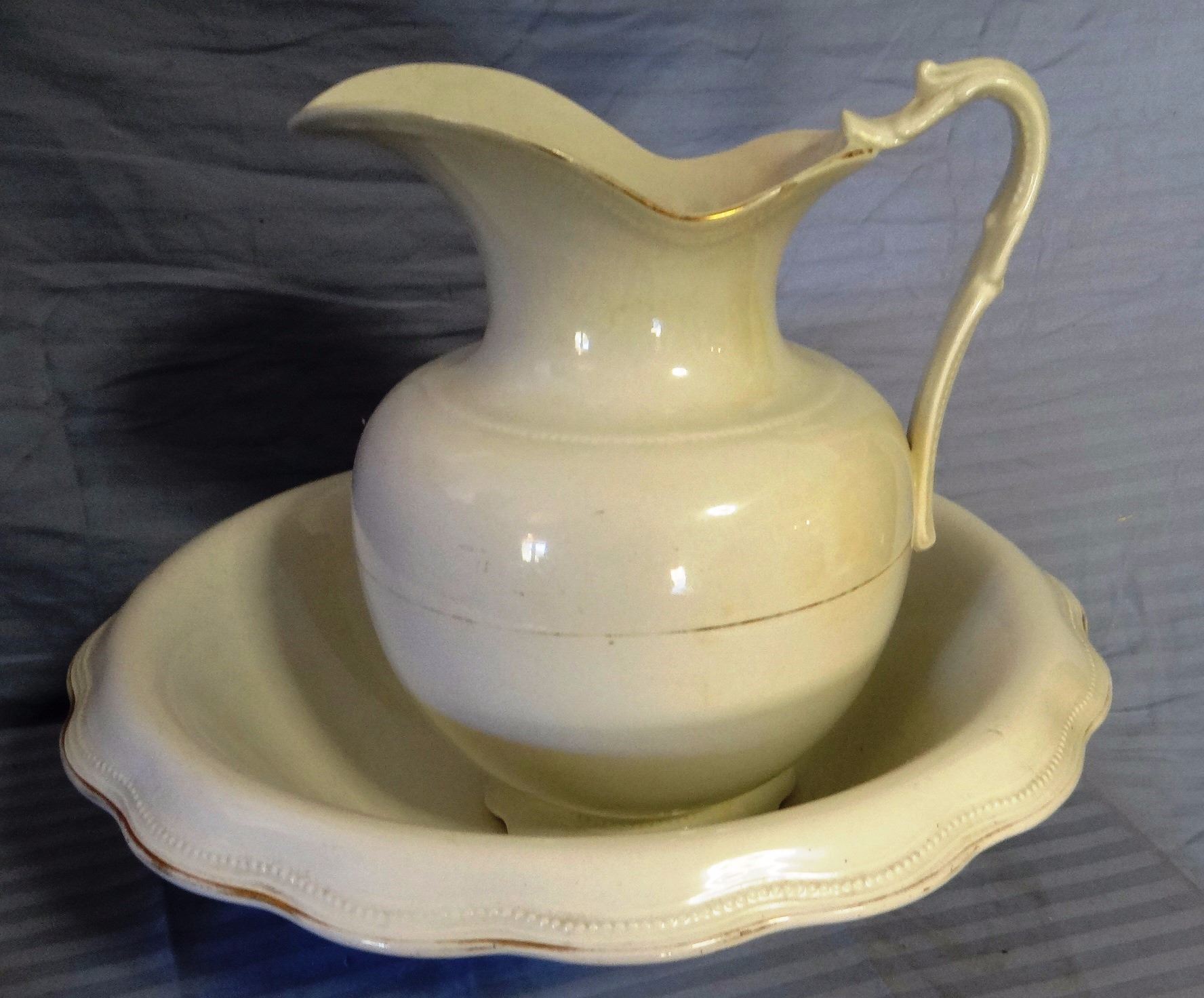 W. S. George pitcher and bowl set, small chip