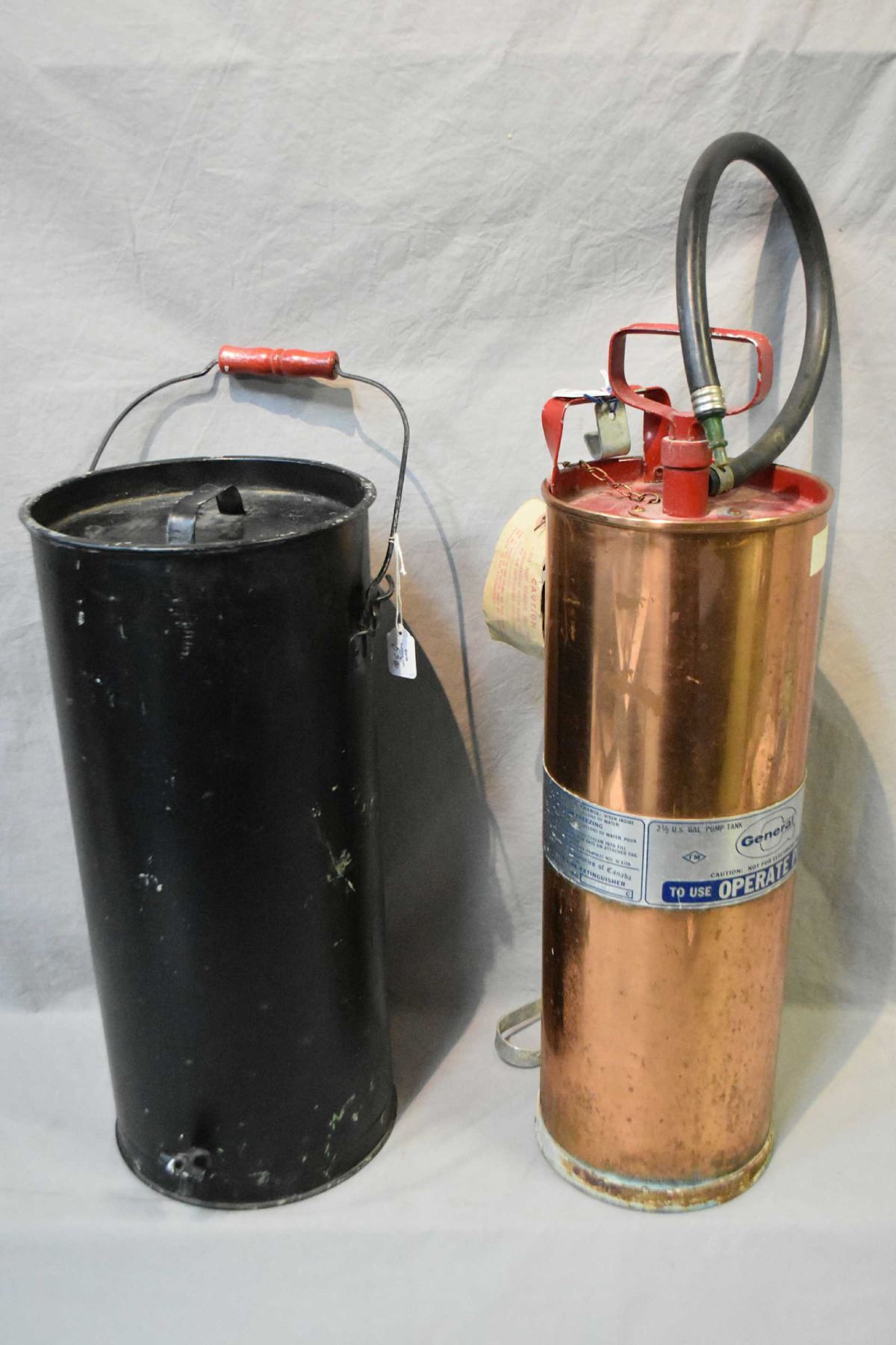 General pump operated copper fire extinguisher and a vintage metal ...