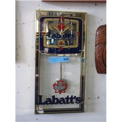 Labatt's Beer Wall Clock with Pendulum
