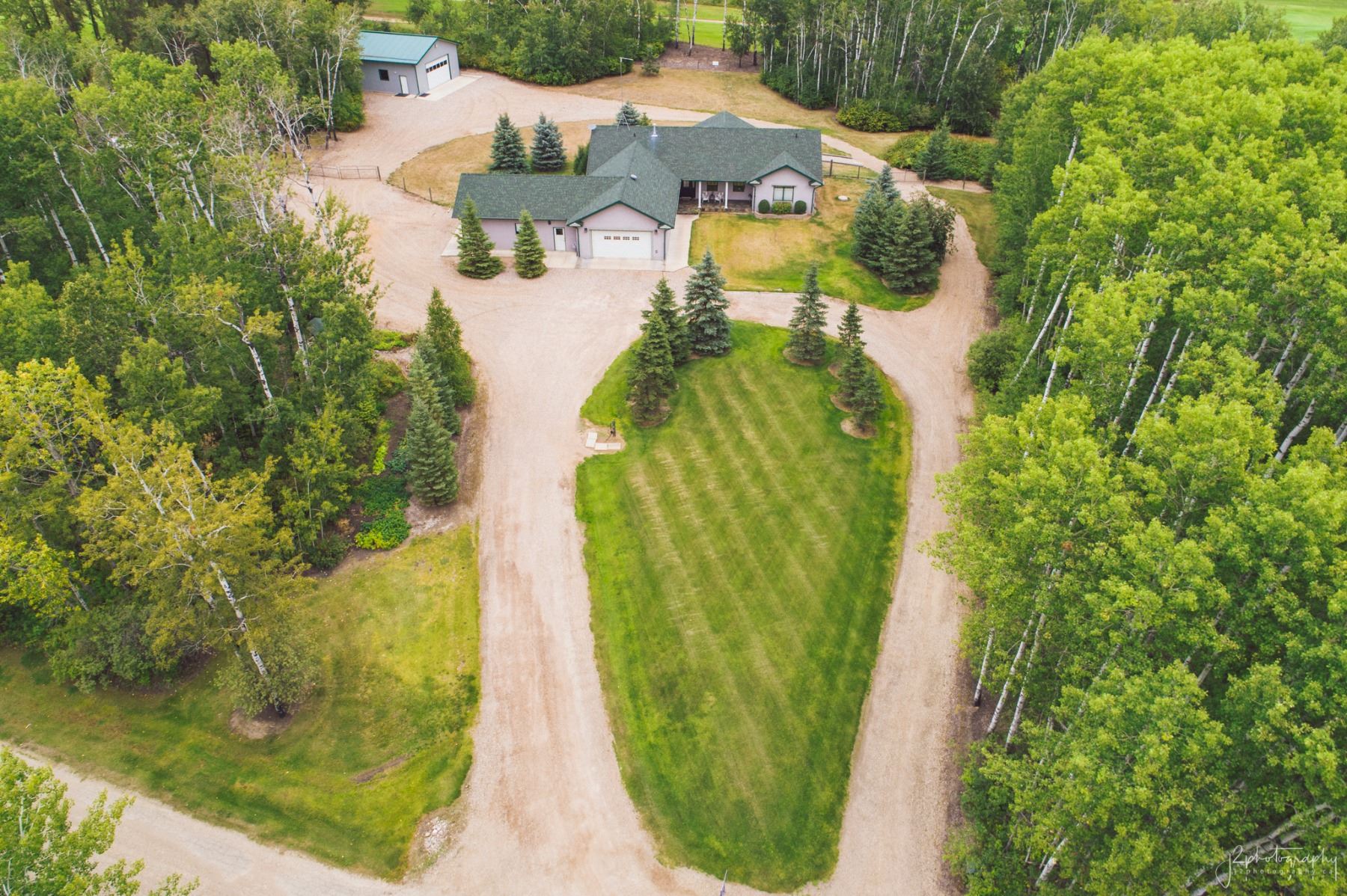 2.7 ACRE acreage with 2480 sq ft bungalow and 2 double attached heated ...