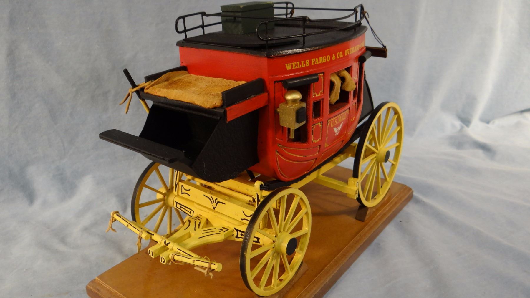 Miniature wooden stage coach by Cortez, (9" h x 12" l
