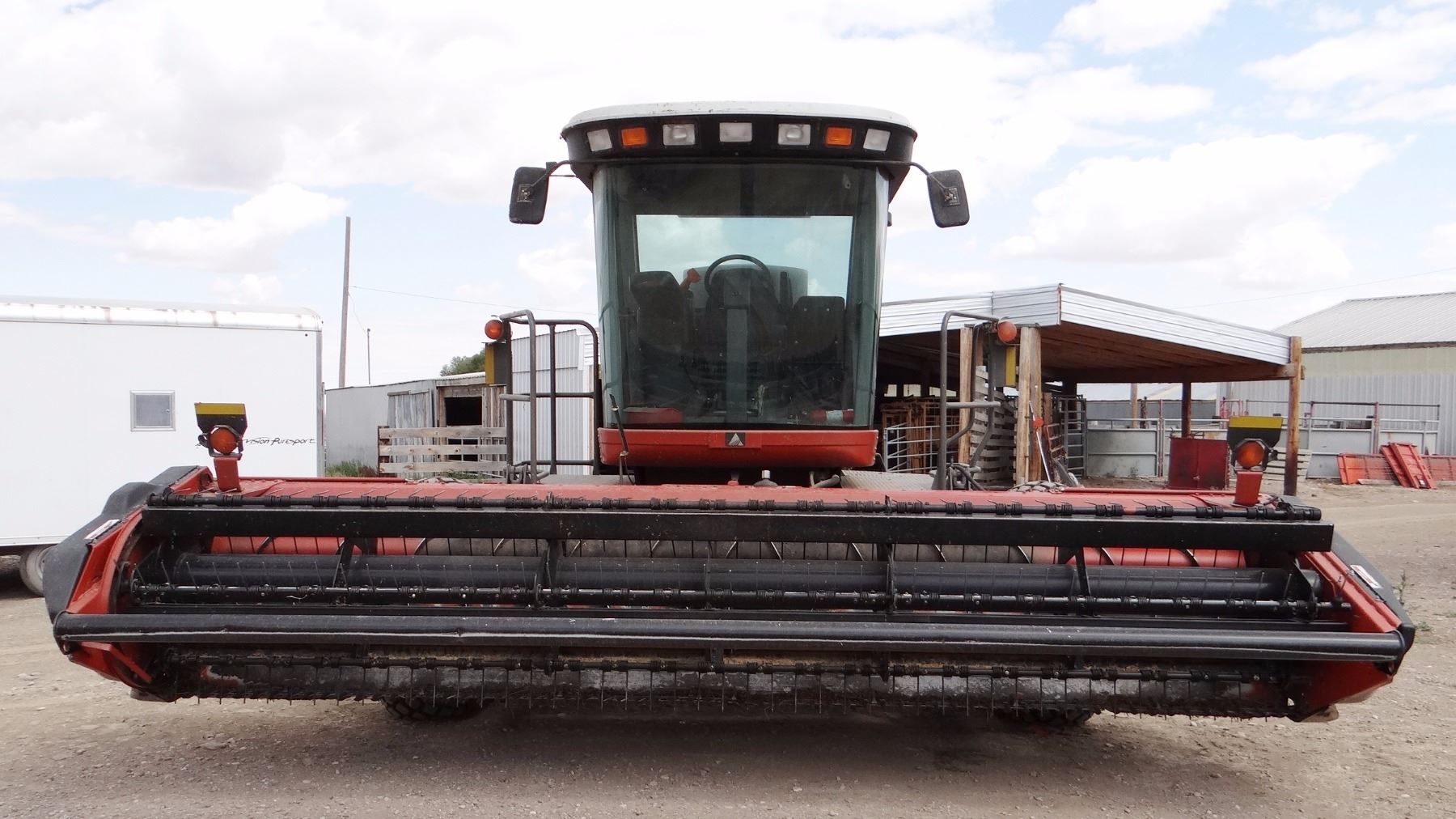 2010 Hesston Agco 9345 swather, 9120 16’ header, dual auger, steel ...