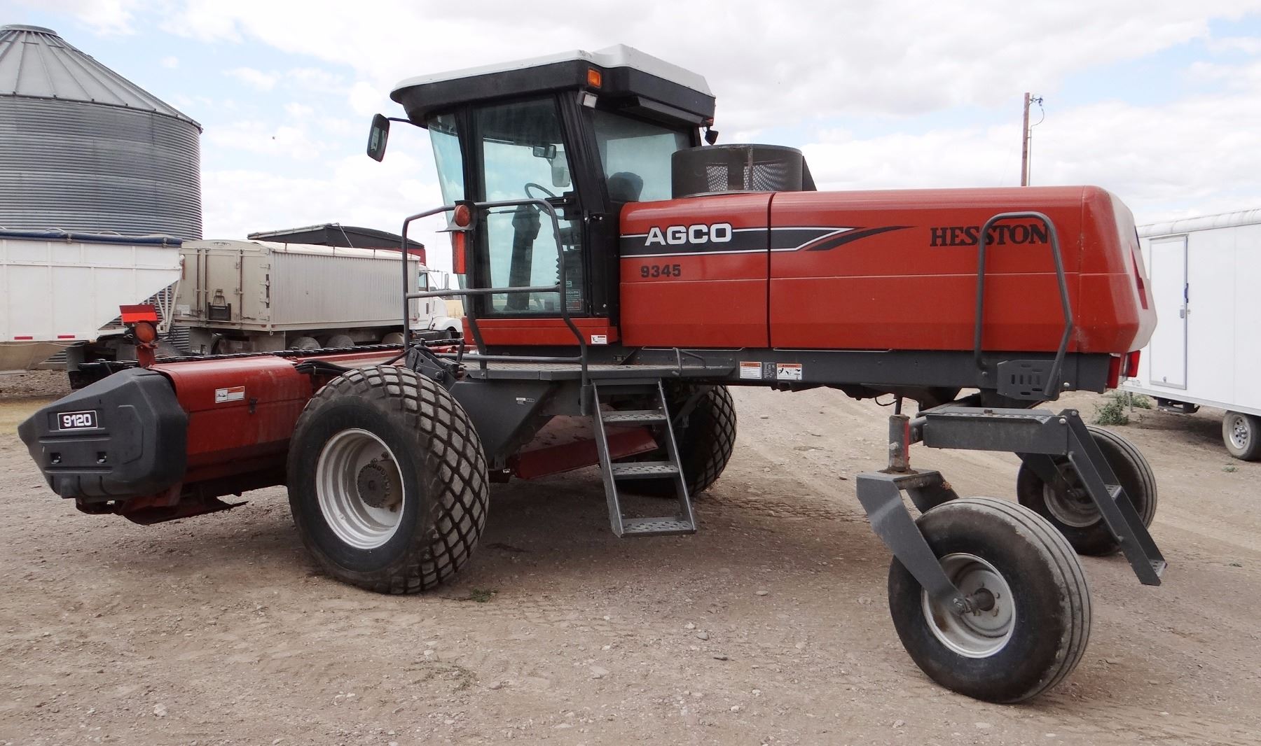 2010 Hesston Agco 9345 swather, 9120 16’ header, dual auger, steel ...