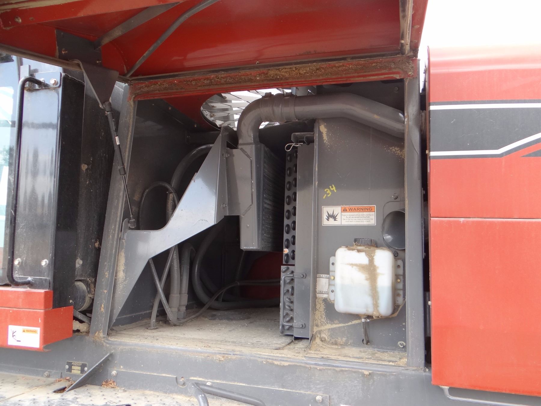 2010 Hesston Agco 9345 swather, 9120 16’ header, dual auger, steel ...
