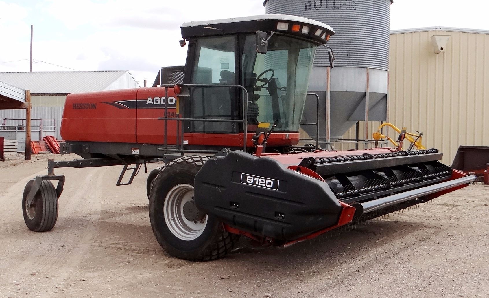 2010 Hesston Agco 9345 swather, 9120 16’ header, dual auger, steel ...