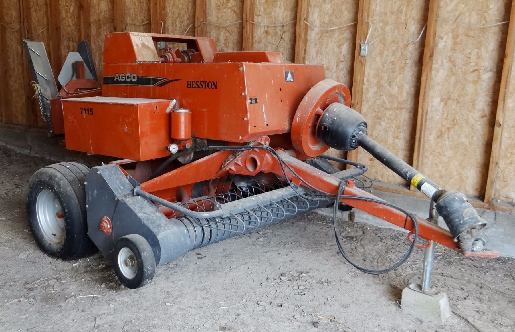 Hesston Agco 7115 in-line square baler, makes a 14’x18” bale