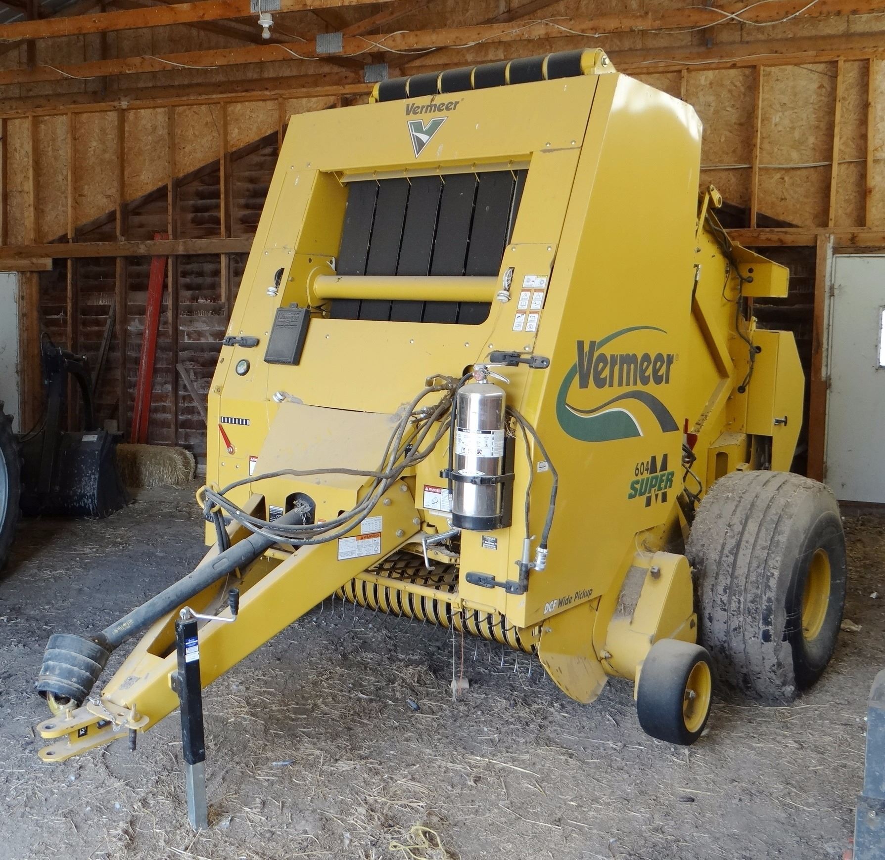 Vermeer 604 Super M round baler, makes a 4 ft.-wide bale